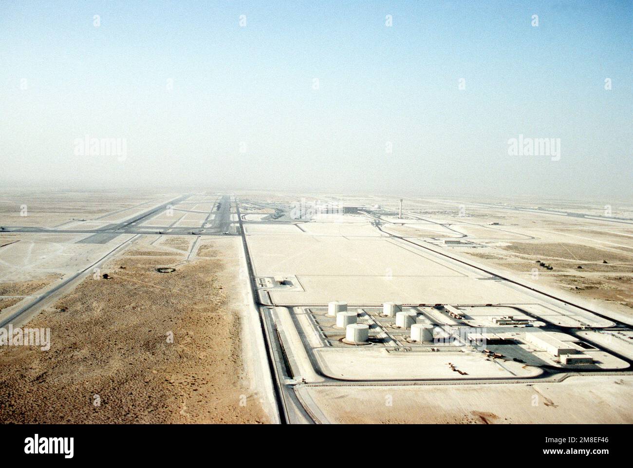 An aerial view of a portion of an air base during Operation Desert ...
