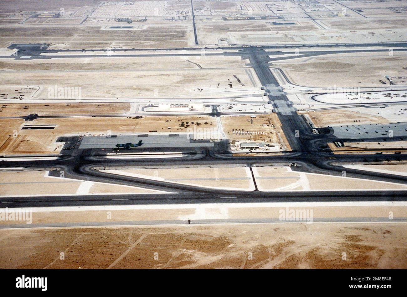An aerial view of a portion of an air base during Operation Desert ...
