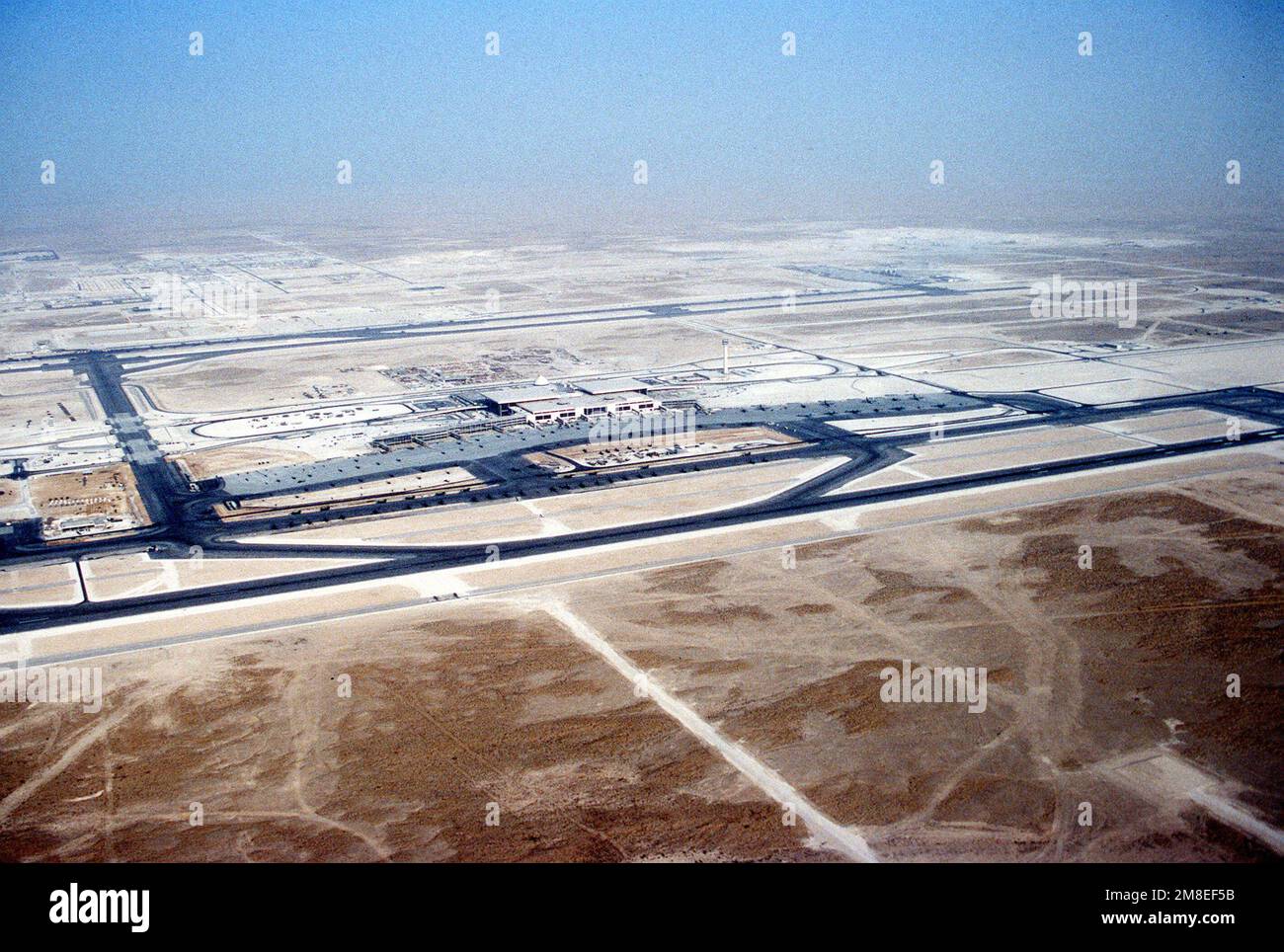 An aerial view of a portion of an air base during Operation Desert ...