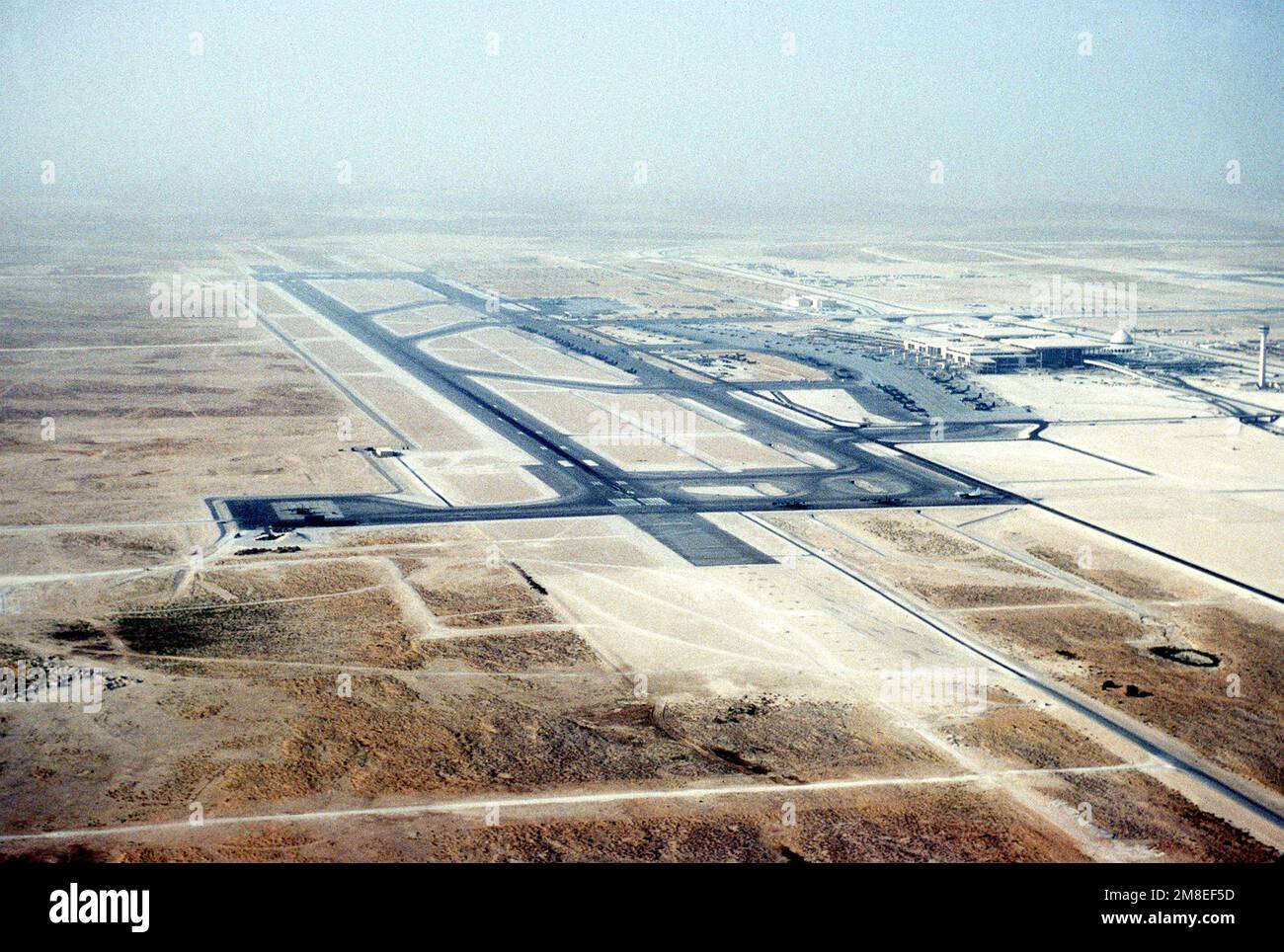 An aerial view of a portion of an air base during Operation Desert ...
