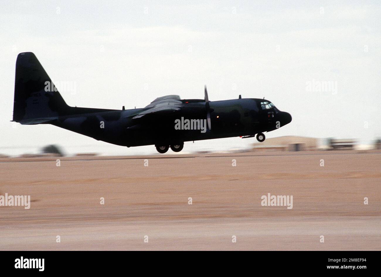 An Air Force Reserve C-130 Hercules aircraft comes in for a landing ...