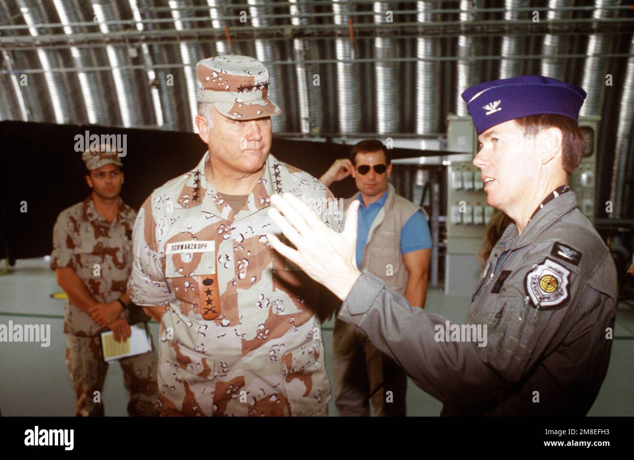An Air Force colonel discusses operations with GEN. H. Norman ...