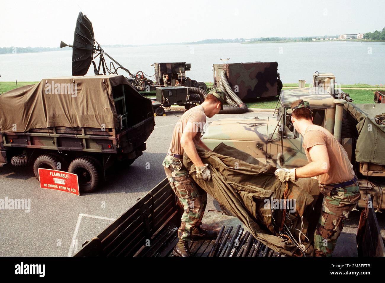 Members of the 74th Tactical Control Squadron set up a satellite ...