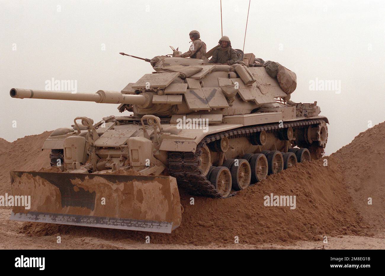 Marines from Company D, 2nd Tank Battalion, drive their M-60A1 main ...