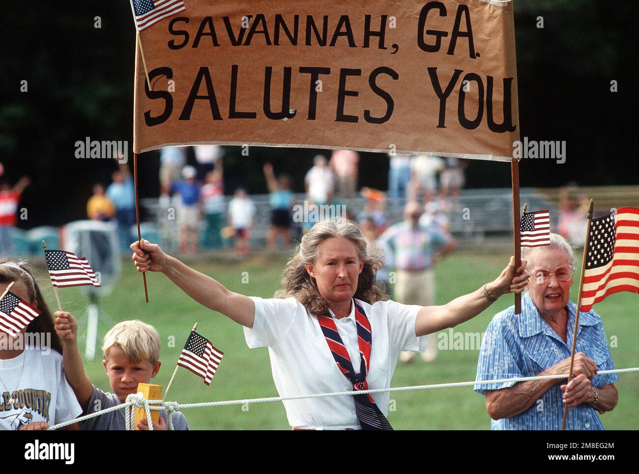 Family members of soldiers in the 24th Infantry Division display ...