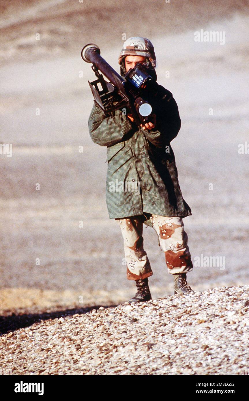 A soldier carries a Stinger anti-aircraft guided missile system during ...