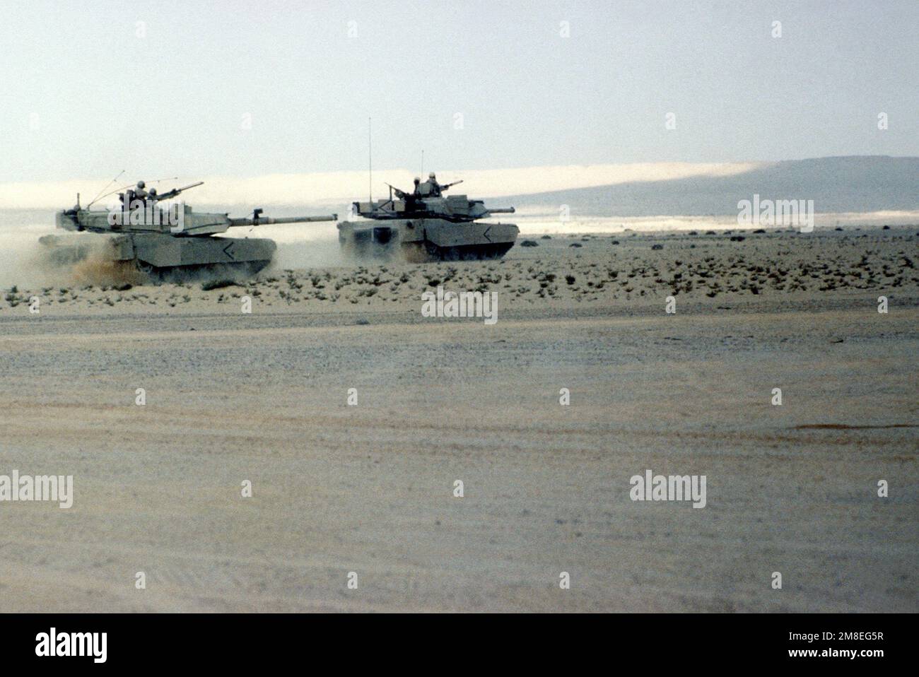 M-1 Abrams main battle tanks move across the desert during Exercise ...