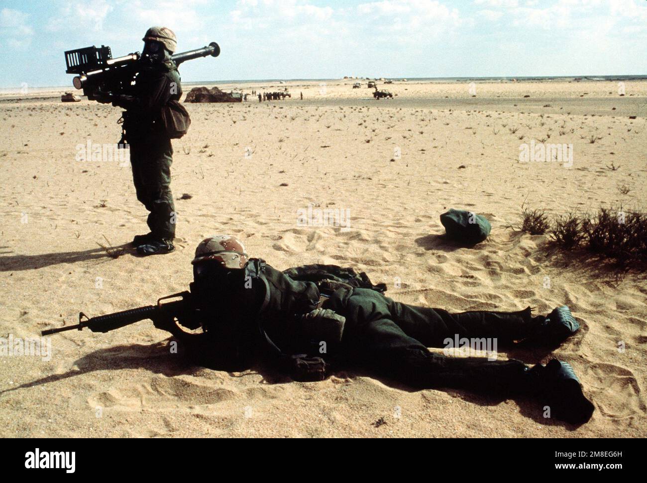 A soldier stands by with a Stinger anti-aircraft guided missile system ...