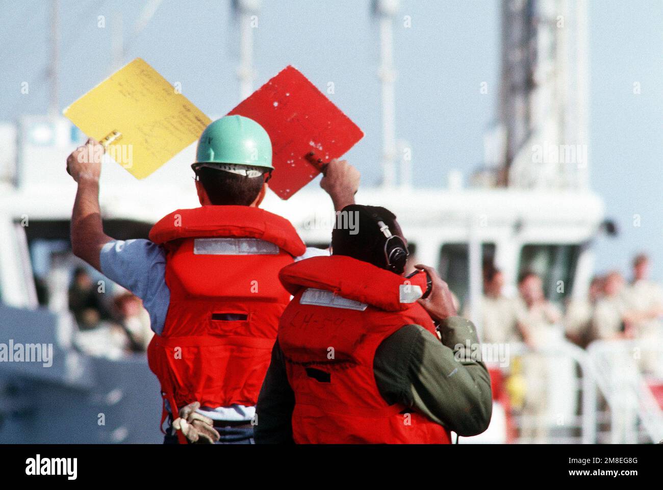 A sailor aboard the amphibious command ship USS BLUE RIDGE (LCC-19 ...