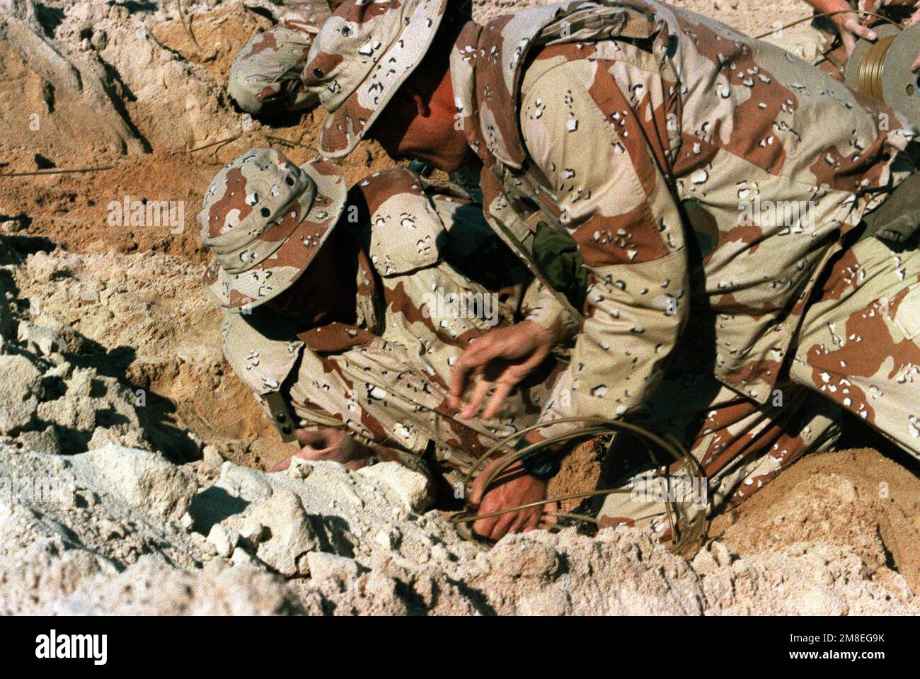 Members of the 2nd Combat Engineer Battalion, Task Force Alpha, place ...