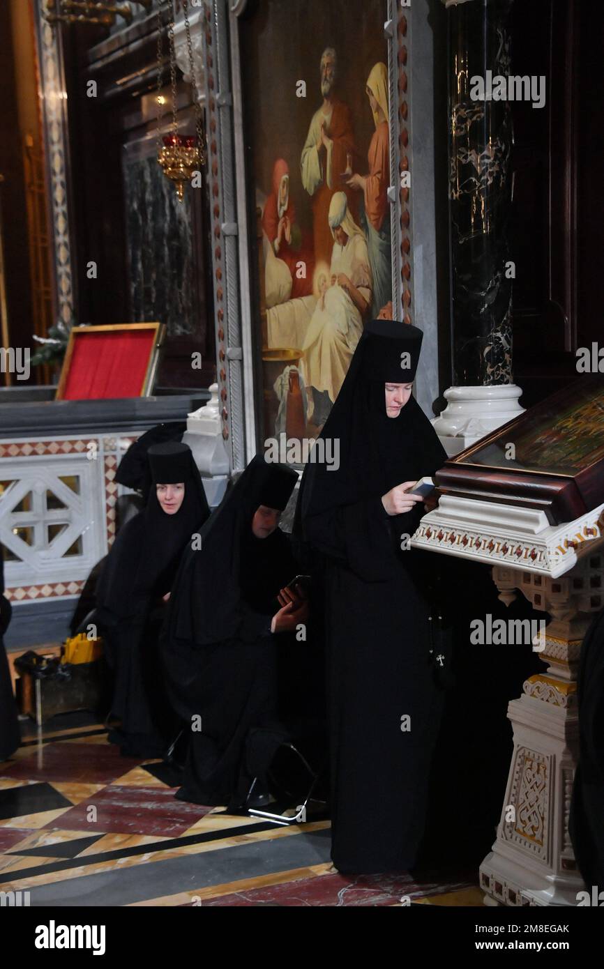 Moscow. The nun before the Christmas church service in Christ the ...