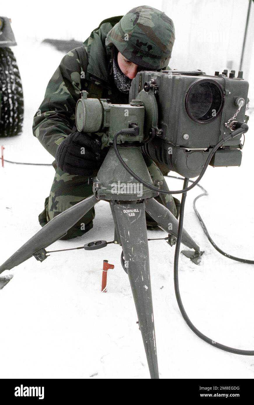 SPEC. Don E. Shoopman of 4th Battalion, 11th Field Artillery, aims an ...