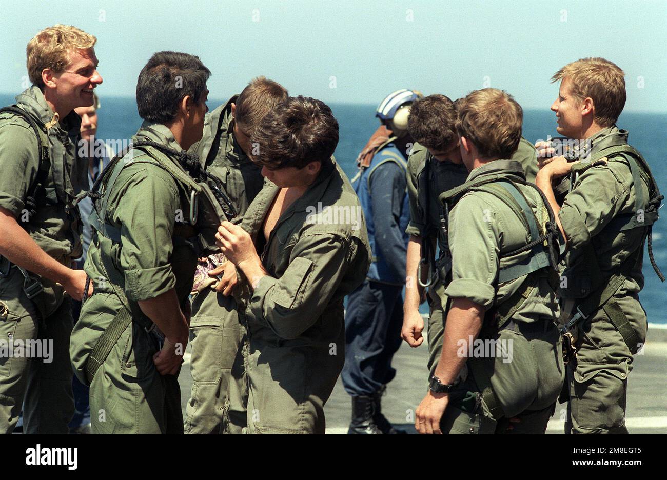 Members of Sea-Air-Land (SEAL) Team 8 and French commandoes prepare for ...