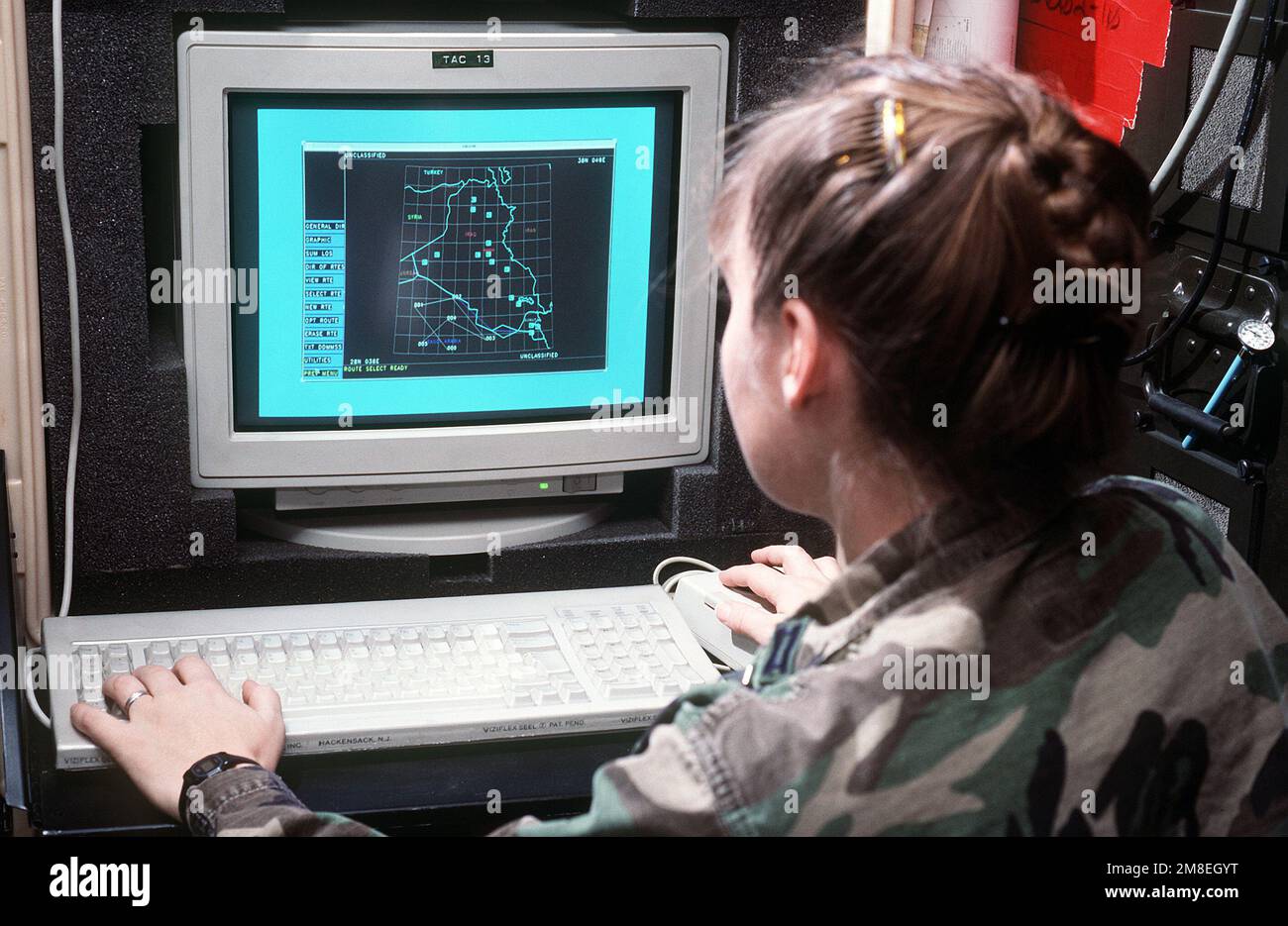 A 33rd Tactical Fighter Wing intelligence officer uses the Images-Many ...