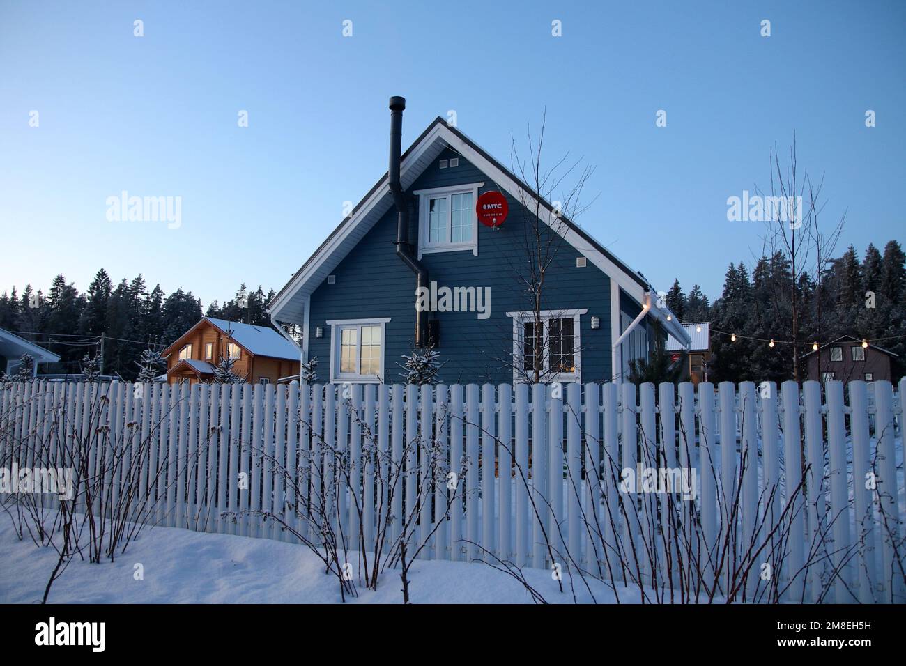 Russian Federation. Leningrad region. Country houses after a snowfall ...