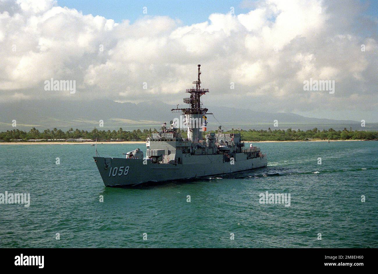 The frigate USS MEYERKORD (FF-1058) departs from the naval station ...
