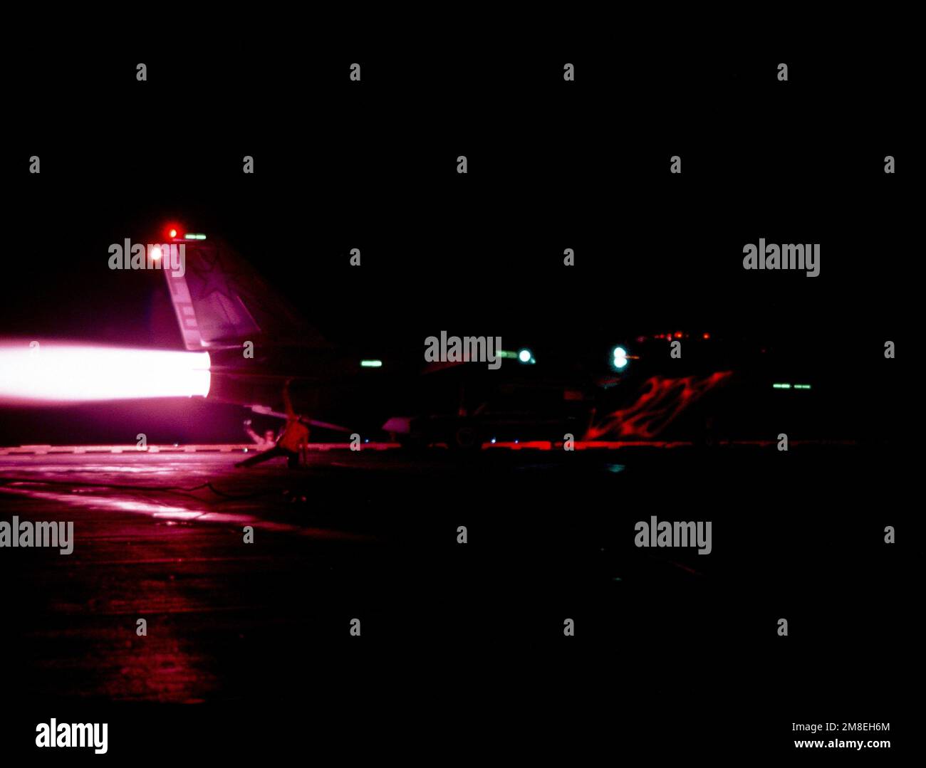 A Fighter Squadron 33 (VF-33) F-14A Tomcat aircraft is launched from ...