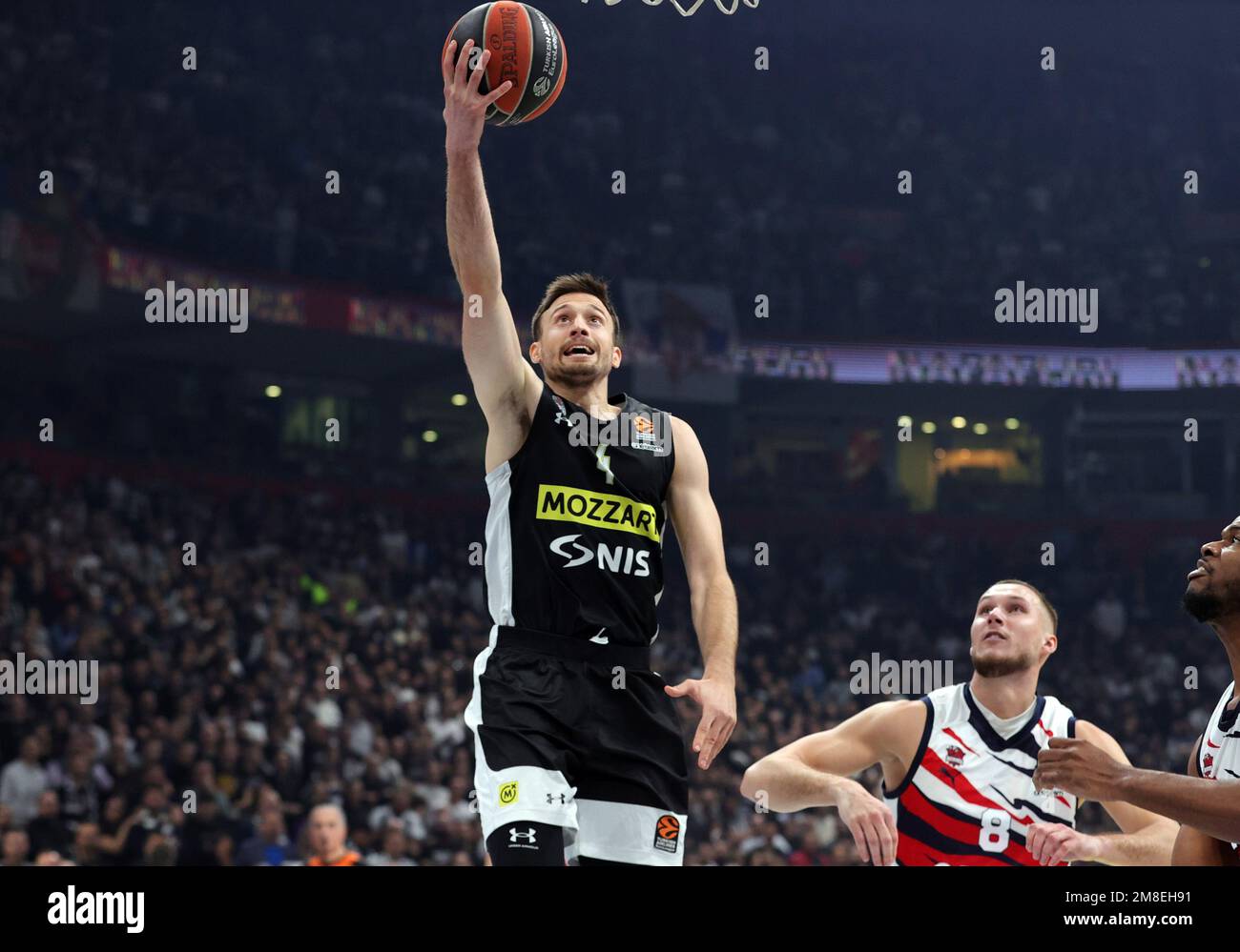 Belgrade, Serbia. 13th Jan, 2023. Partizan's Aleksa Avramovic (L) goes ...
