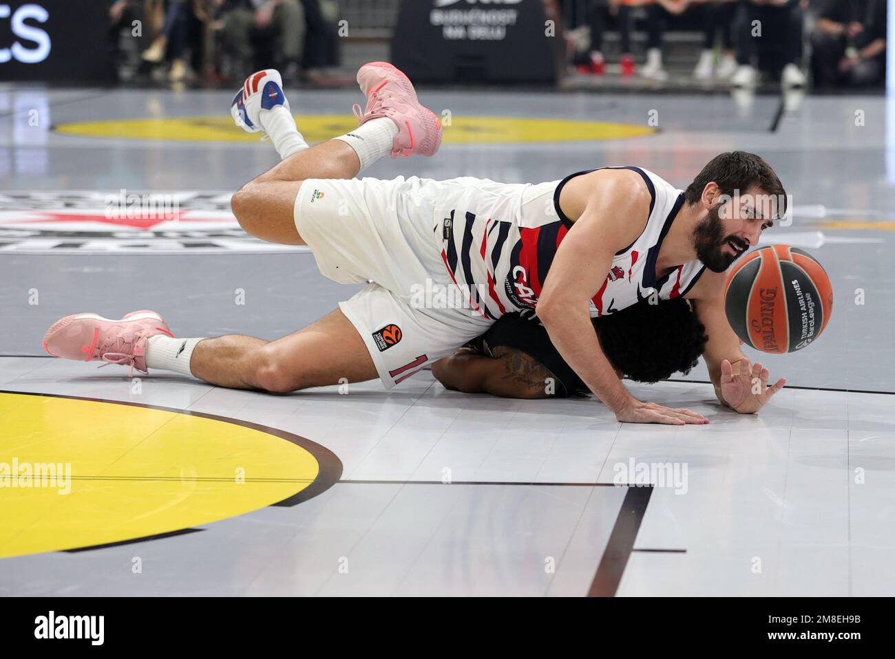 Belgrade, Serbia. 13th Jan, 2023. Baskonia's Daniel Diez (top) vies ...