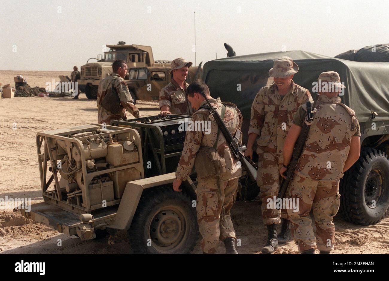 Marines from the 2nd Combat Engineer Battalion prepare to move a ...