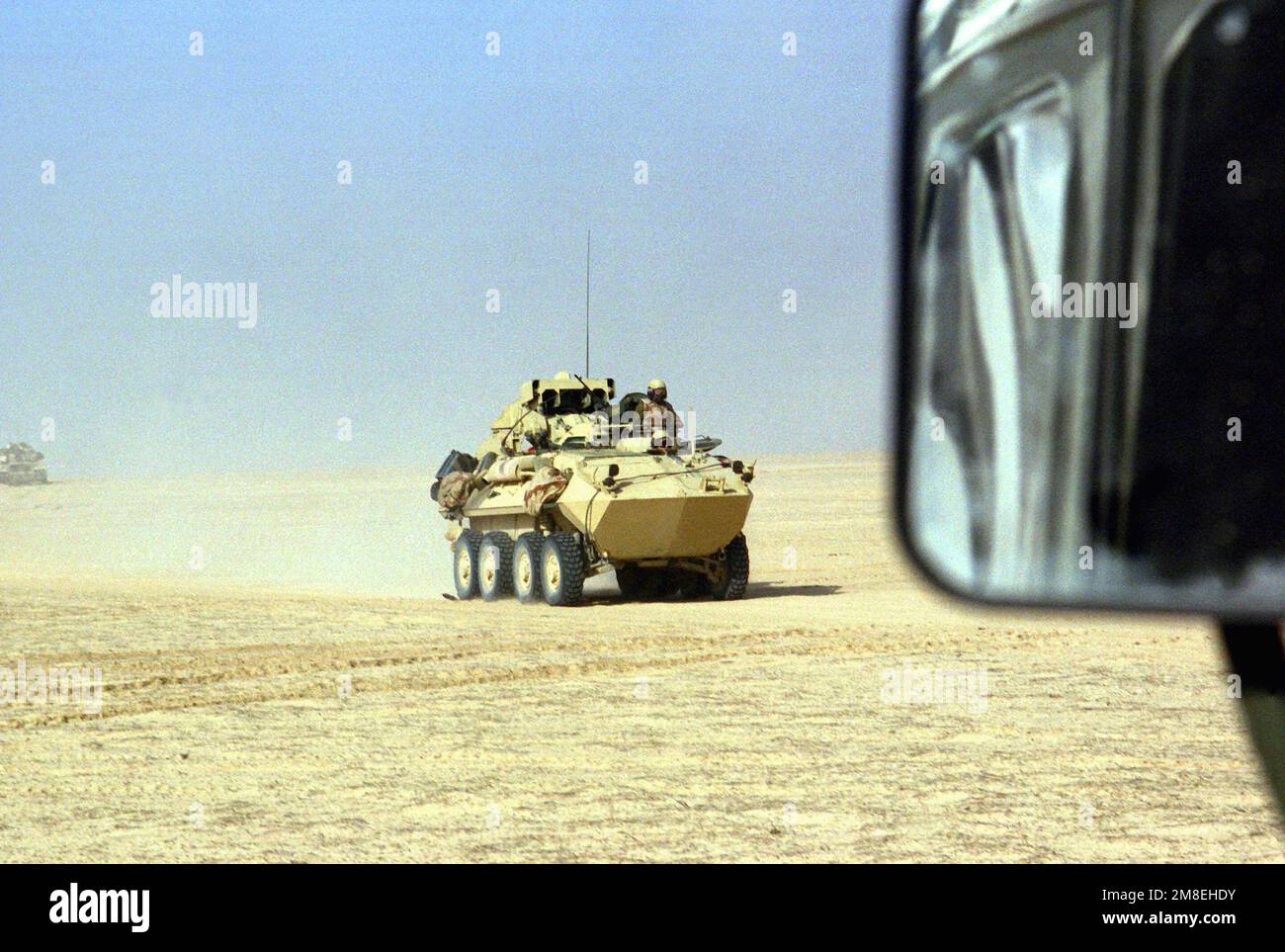 An LAV-AT light armored anti-tank vehicle is driven past Task Froce ...