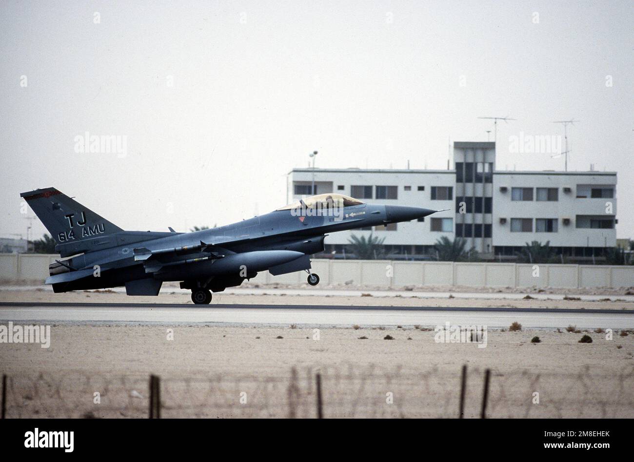 A 614th Tactical Fighter Squadron F-16C Fighting Falcon aircraft lands ...