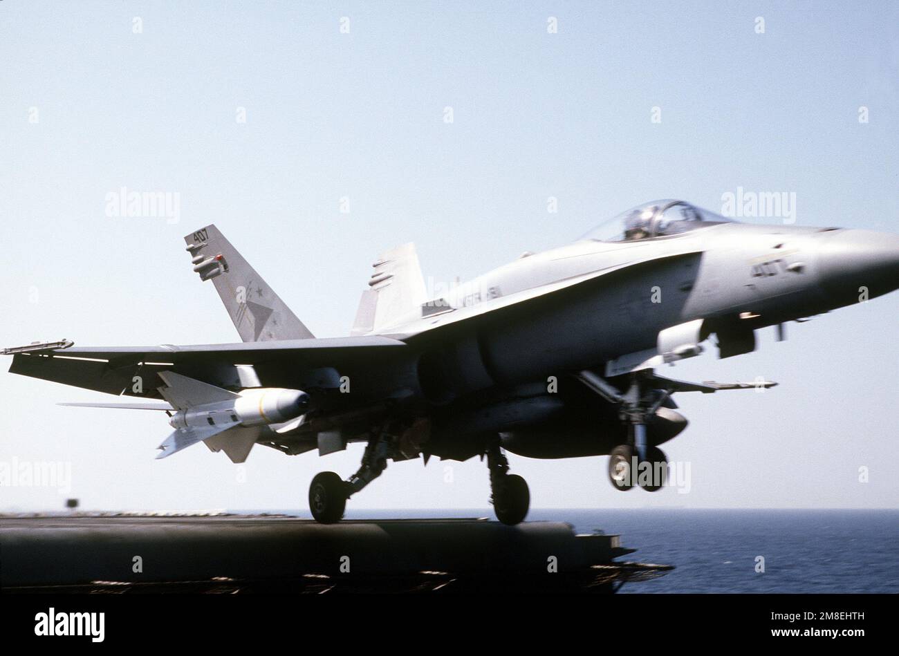 A Strike Fighter Squadron 81 (VFA-81) F/A-18C Hornet aircraft carrying ...