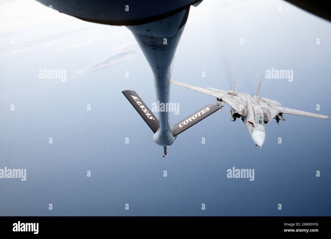 A Fighter Squadron 14 (VF-14) F-14A Tomcat aircraft breaks away after ...