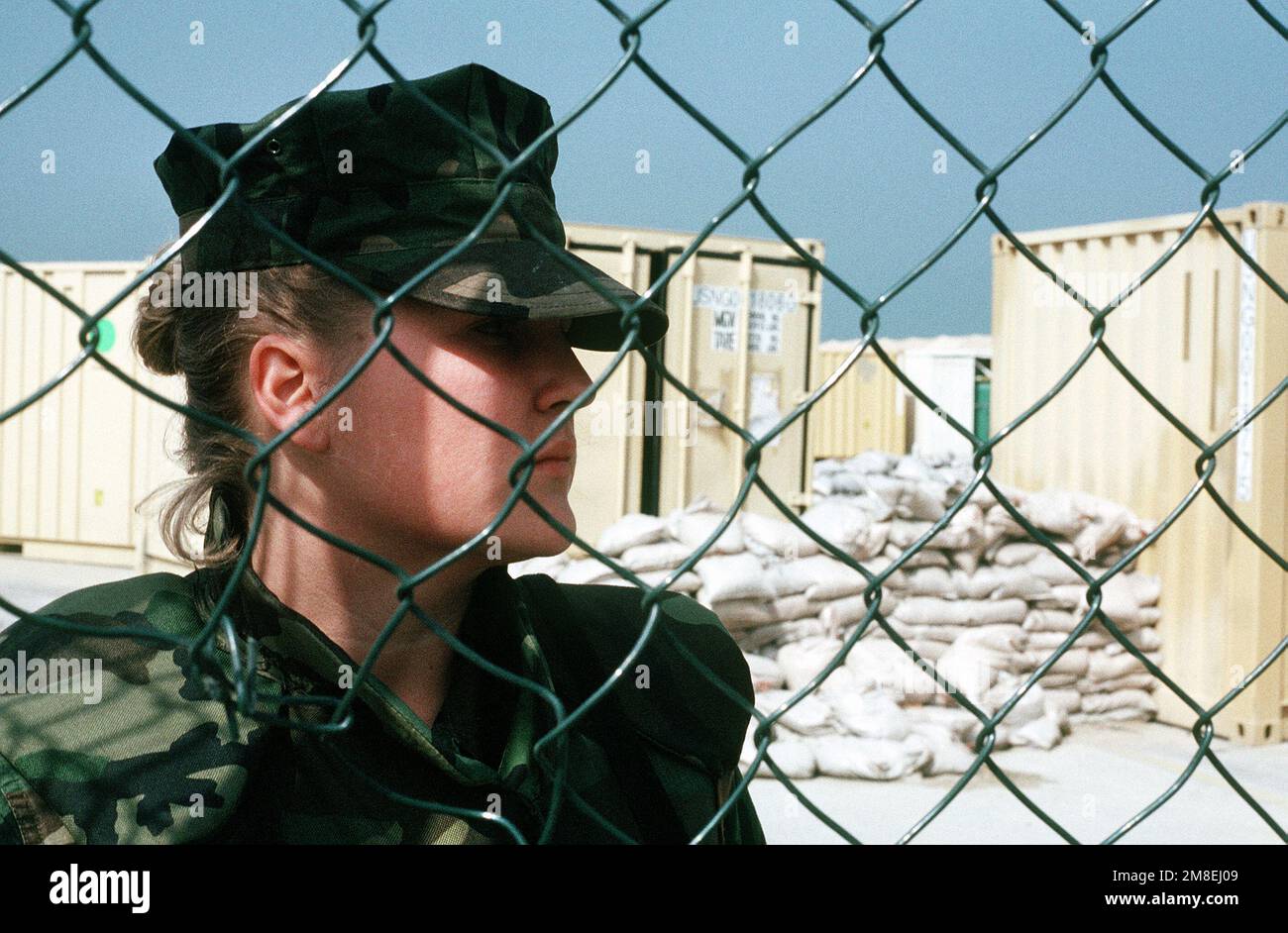 Hospitalman Ronda Rollins stands guard at the front gate of the Fleet ...