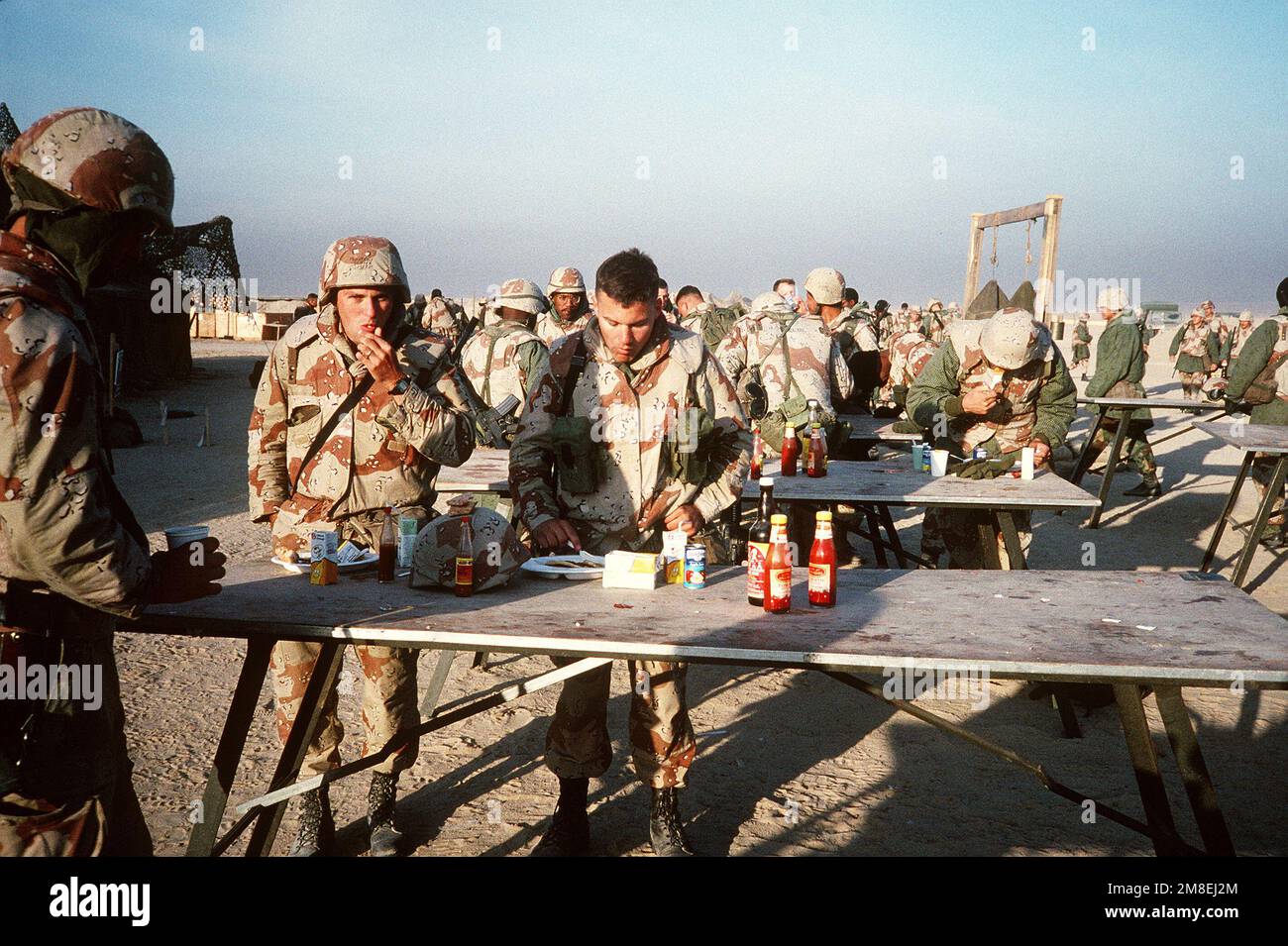 Marines stand at field tables to eat breakfast while in northern Saudi ...
