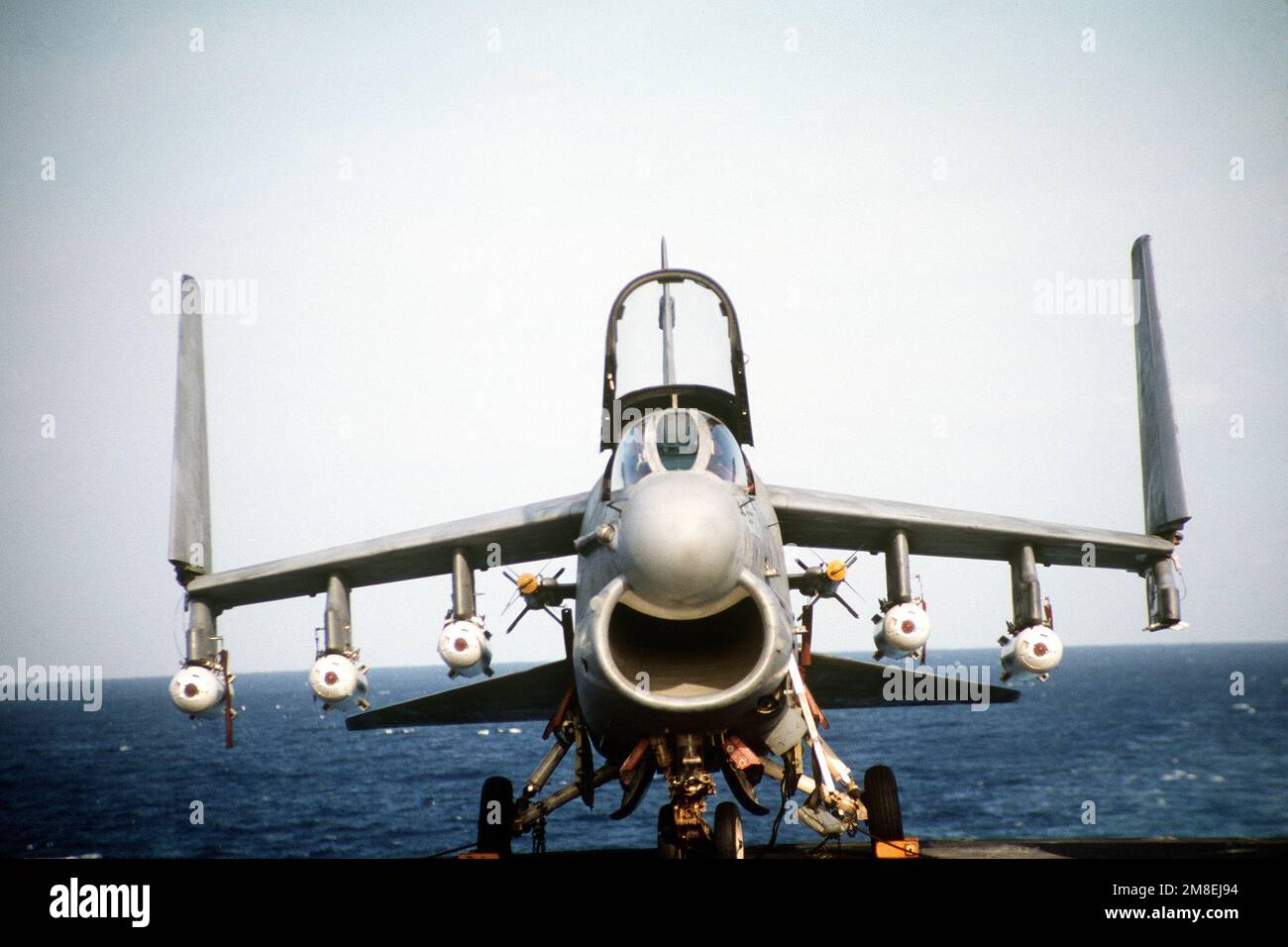 An Attack Squadron 72 (VA-720 A-7E Corsair aircraft sits on the flight ...