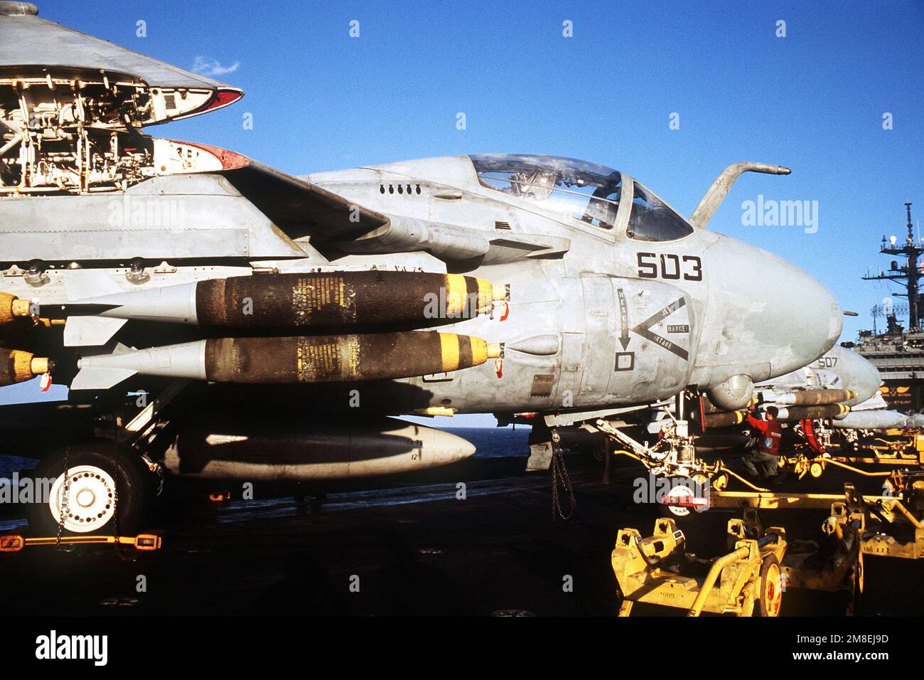 An Attack Squadron 75 (VA-75) A-6E Intruder aircraft sits armed and ...
