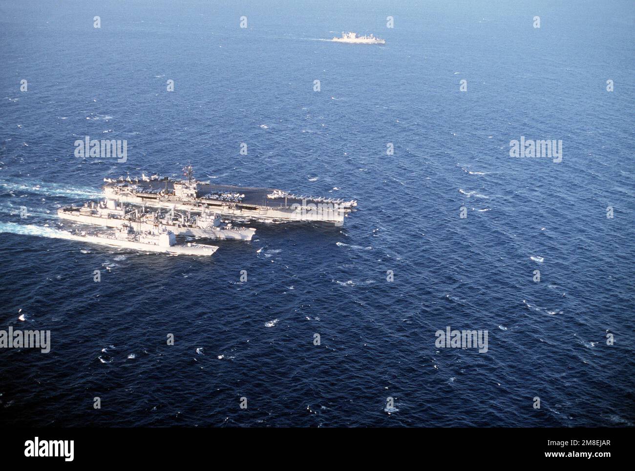 The guided missile cruiser USS SAN JACINTO (CG-56), bottom, the fast ...
