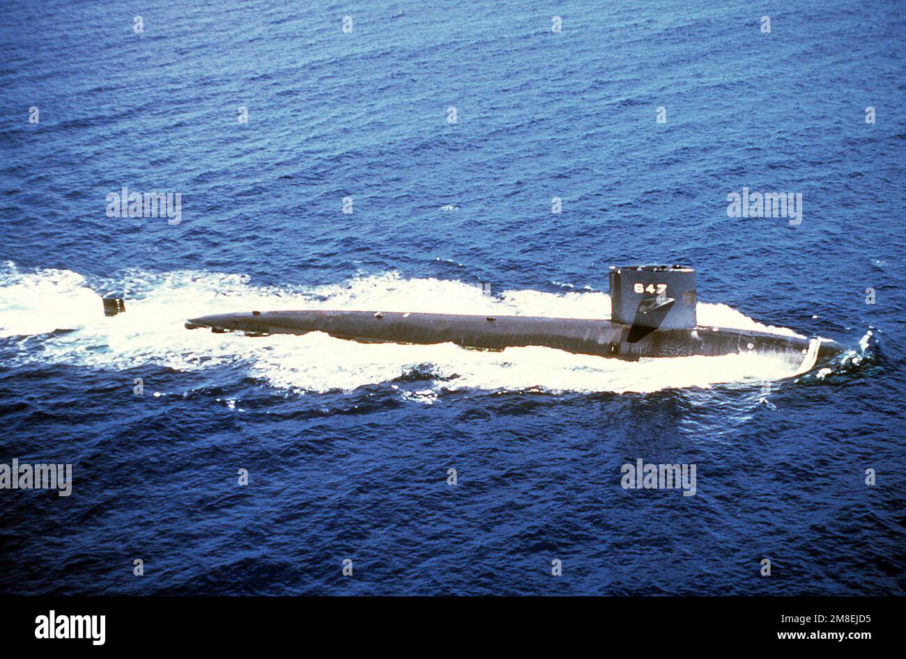 A starboard beam view of the nuclear-powered attack submarine USS POGY ...