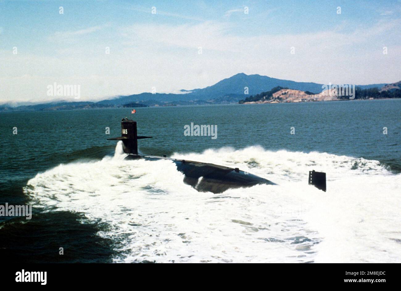 A port quarter view of the nuclear-powered attack submarine USS ...