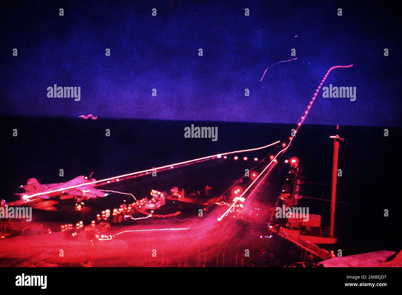 An extended exposure view of night flight operations aboard the ...