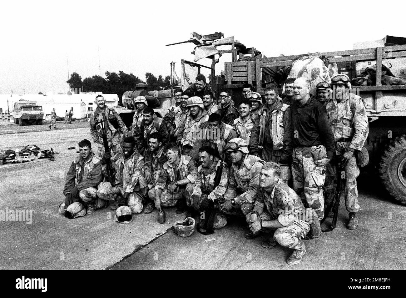 Marines of the 1ST Marine Division gather for a group photograph in a ...