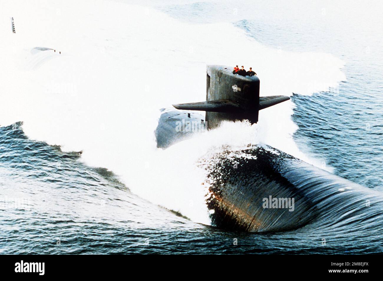 A starboard bow view of the nuclear-powered attack submarine USS ...