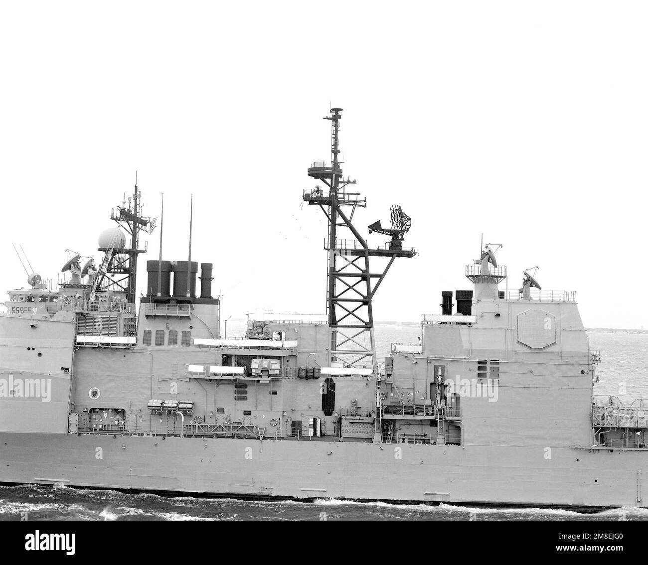 A view of the starboard amidships section of the guided missile cruiser ...
