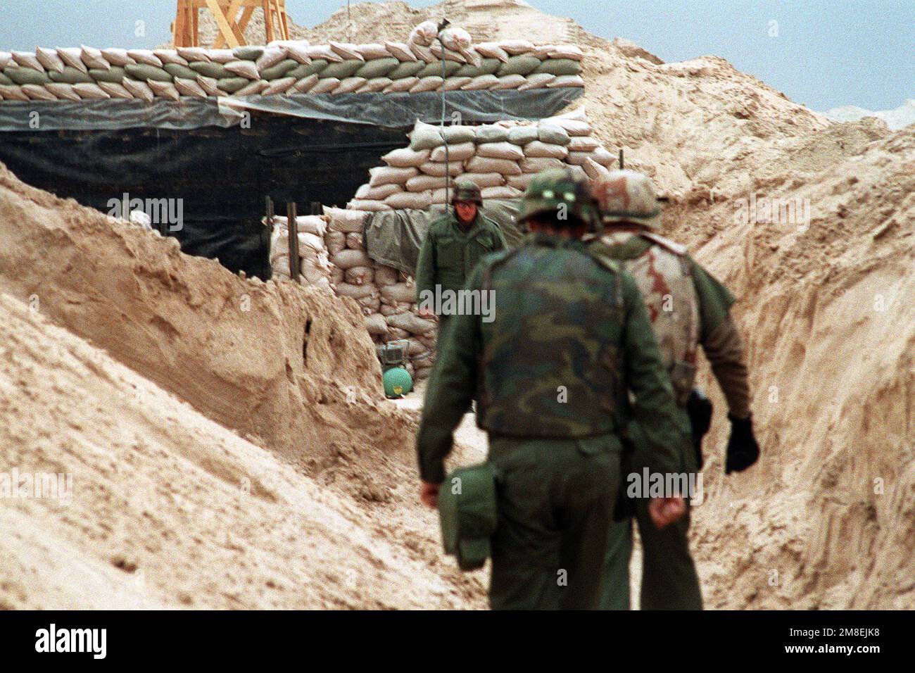 Seabees from Naval Mobile Construction Battalion 5 (NMCB-5)move through ...