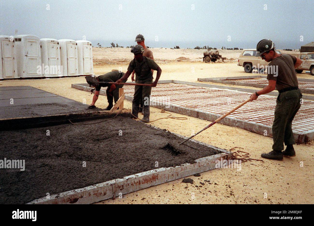 Seabees from Naval Mobile Construction Battalion 5 (NMCB-5) spread ...
