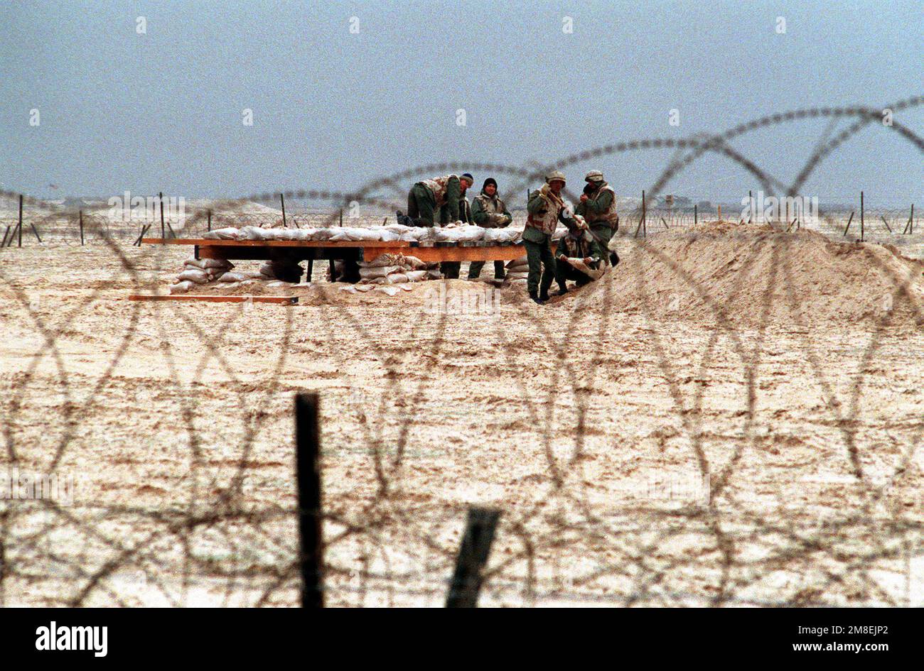 Seabees from Naval Mobile Construction Battalion 5 (NMCB-5) fill ...