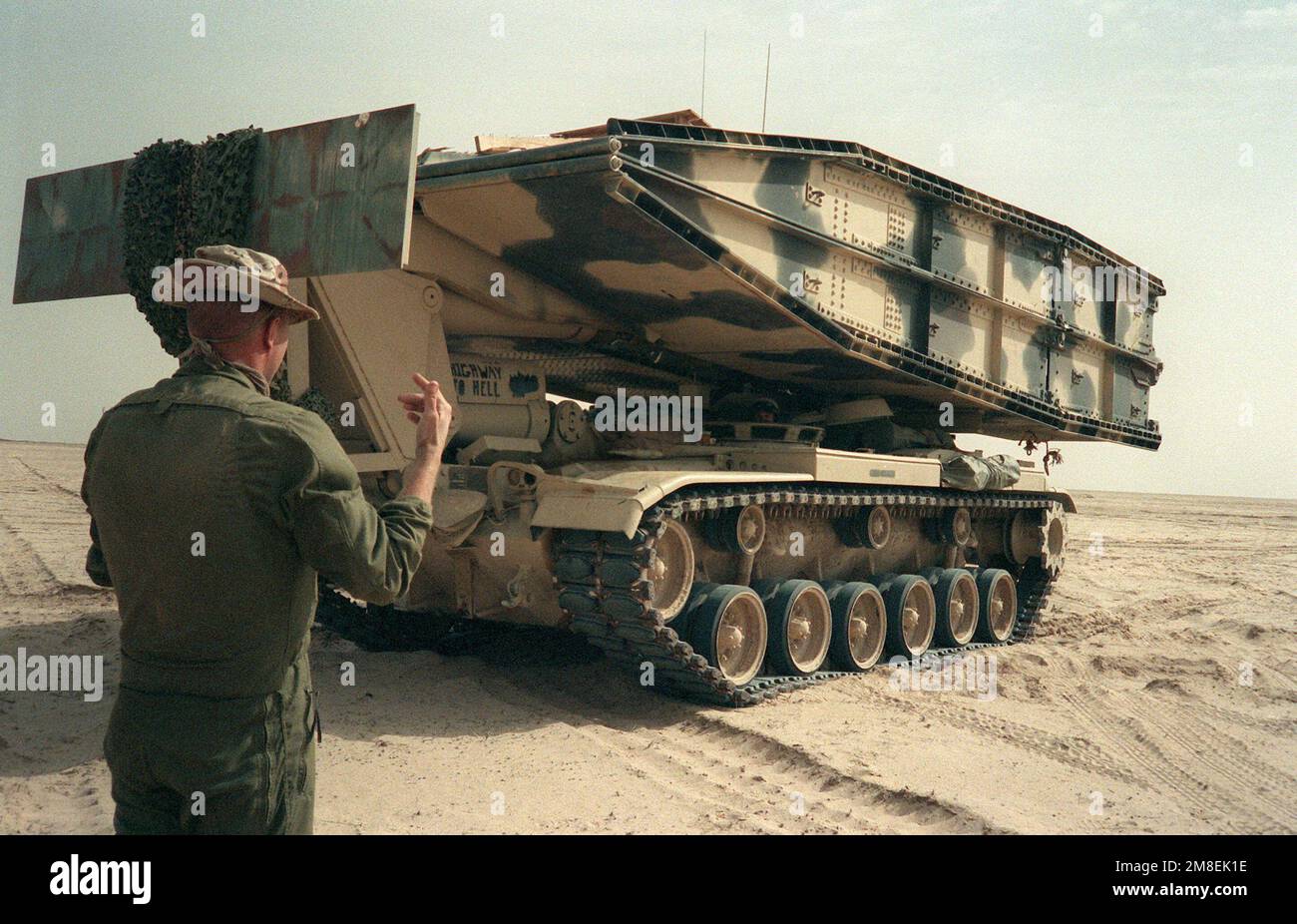 The vehicle commander of a Marine Corps M-60 Armored Vehicle Launched ...