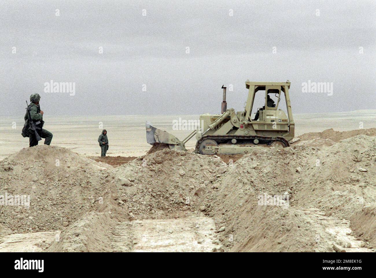 Members of Naval Mobile Construction Battalion 5 stand watch while ...