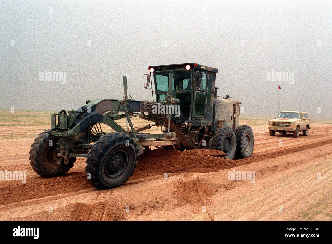 A road grader used by members of a Naval Mobile Construction Battalion ...