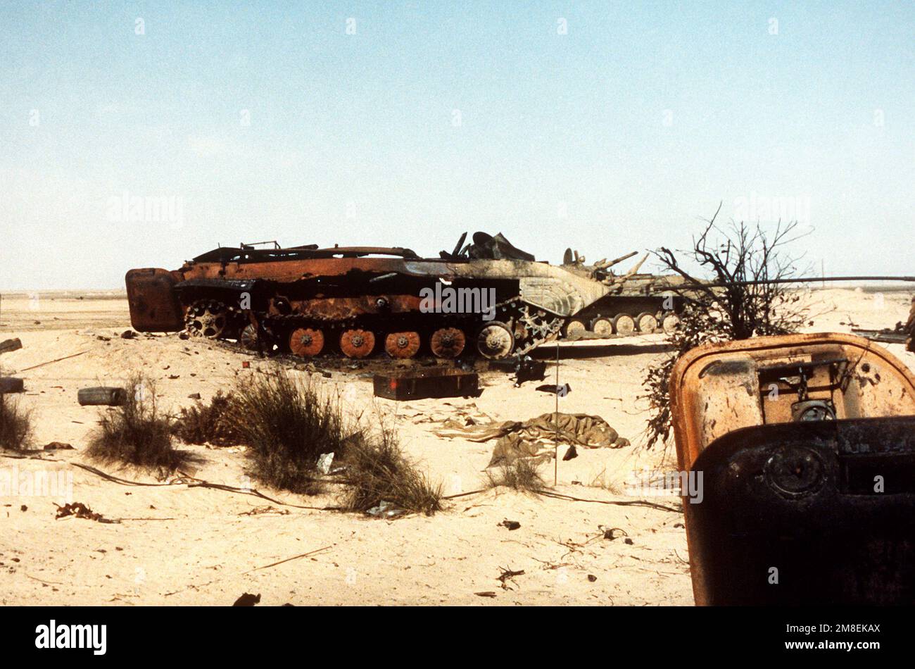 The burned-out hull of an Iraqi BMP-1 mechanized infantry combat ...