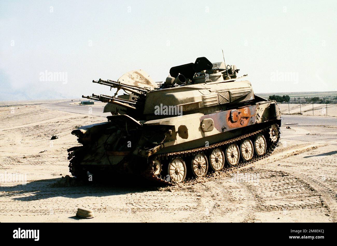 An Iraqi ZSU-23-4 self-propelled 23mm anti-aircraft gun system sits on ...