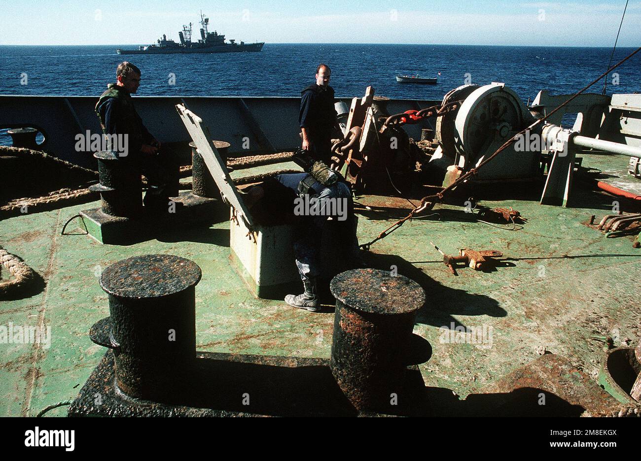 Members of a boarding party from the guided missile destroyer USS ...
