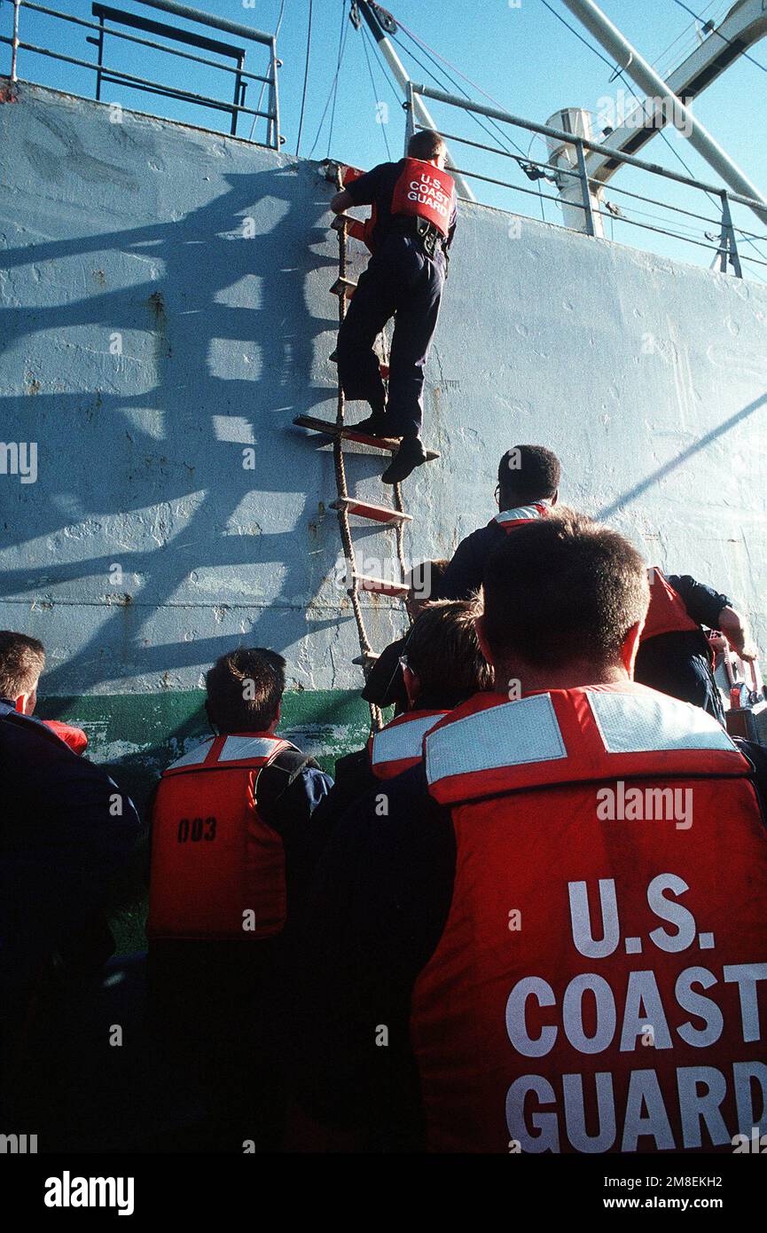 Members of a U.S. Coast Guard Law Enforcement Detachment (LEDET) board ...