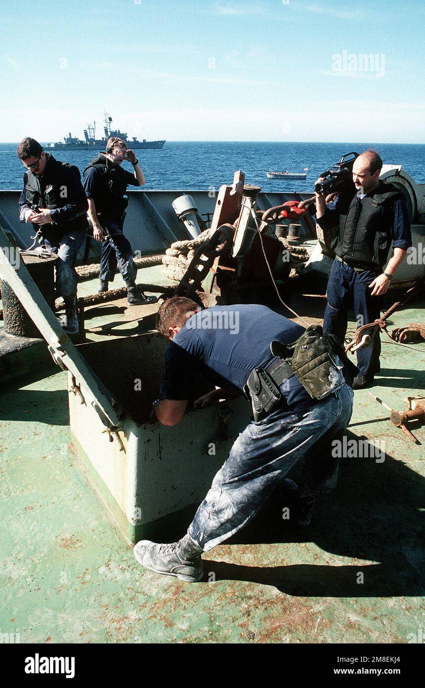 Members of a boarding party from the guided missile destroyer USS ...